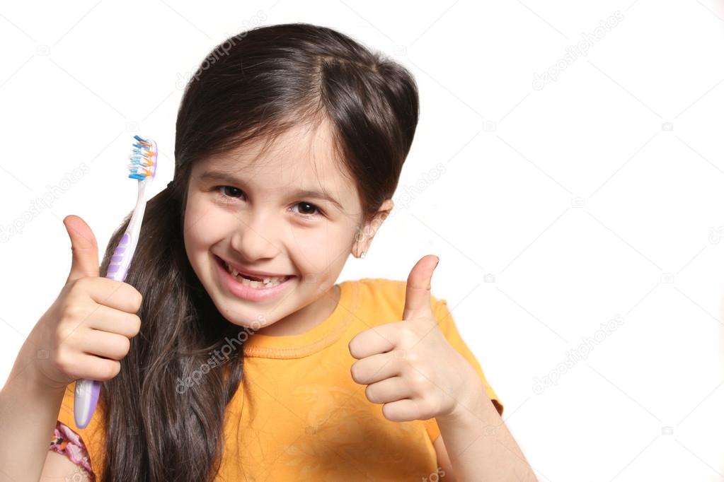 Missing two front teeth Stock Photo by ©gvictoria 71980843