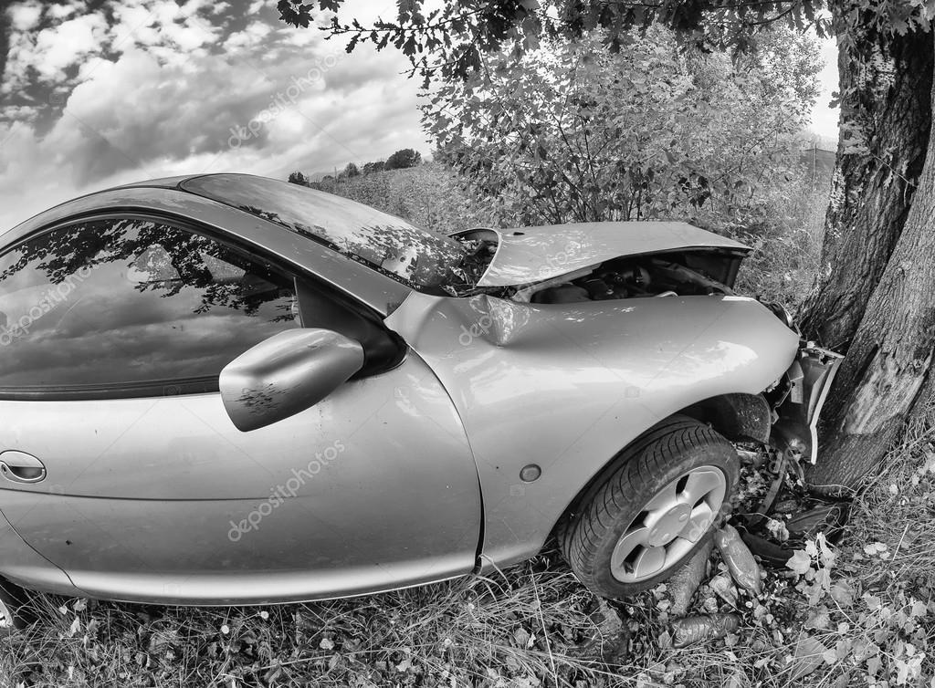 Car crash against a tree Stock Photo by ©jovannig 118886868