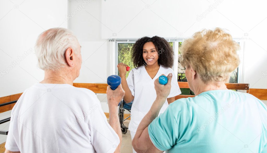 Happiness in elder rehab facility. Retired successful people Stock ...