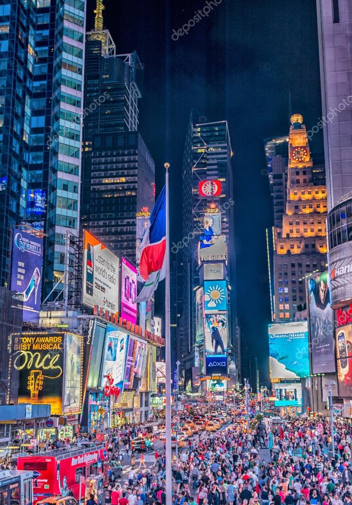 Tourists in Times Square at night. – Stock Editorial Photo © jovannig ...
