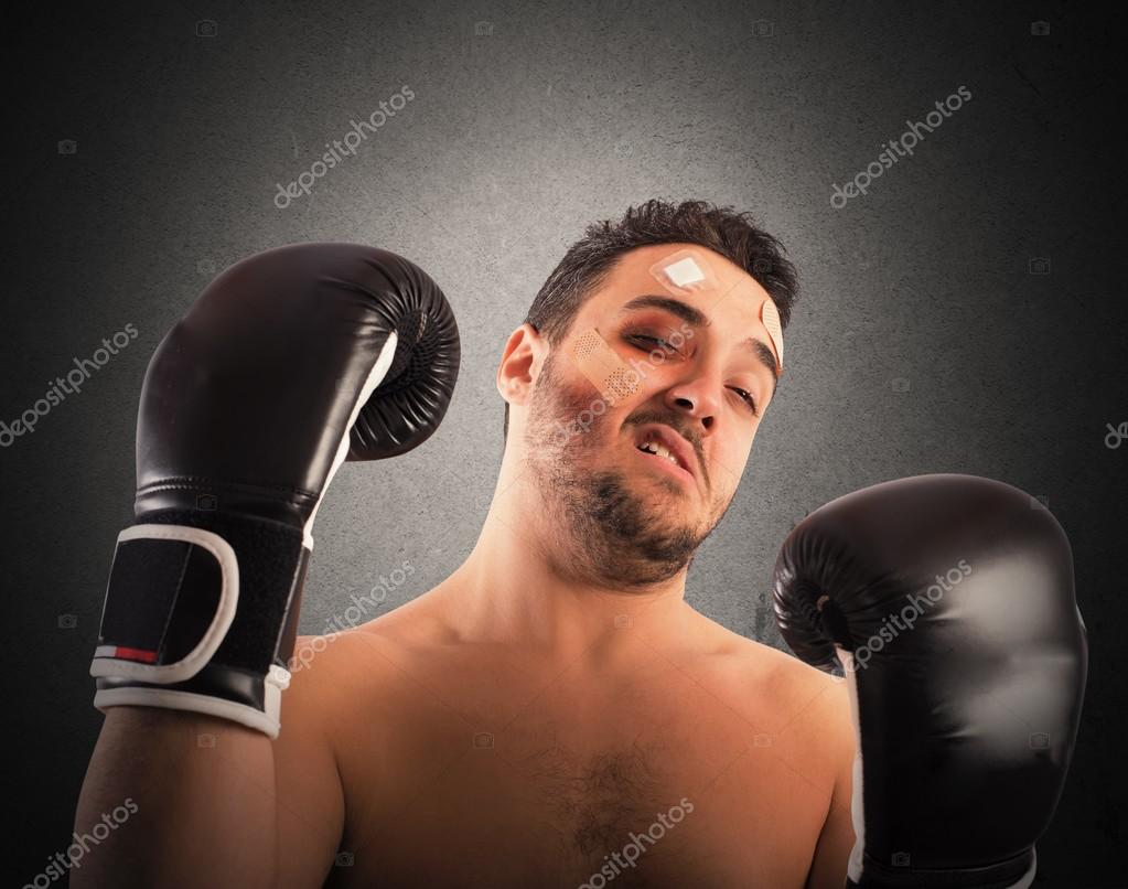 Boxer with bruises and bandages Stock Photo by ©alphaspirit 106593096