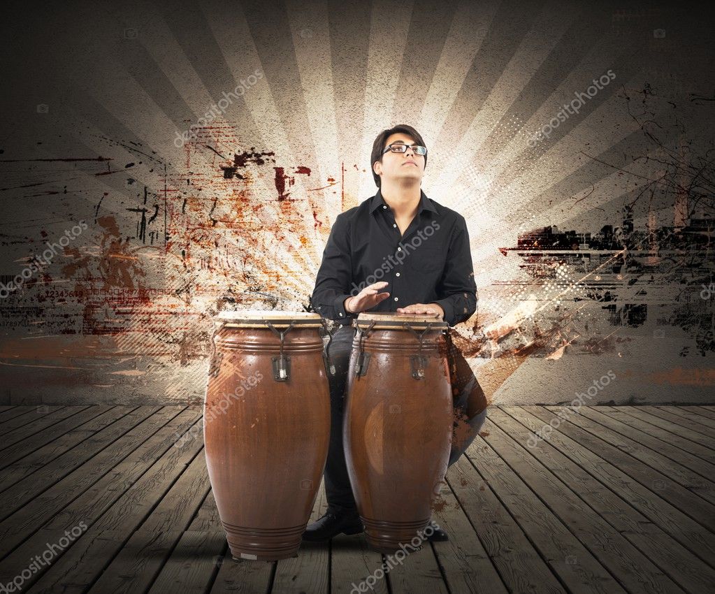 Young percussionist playing — Stock Photo © alphaspirit #56118873