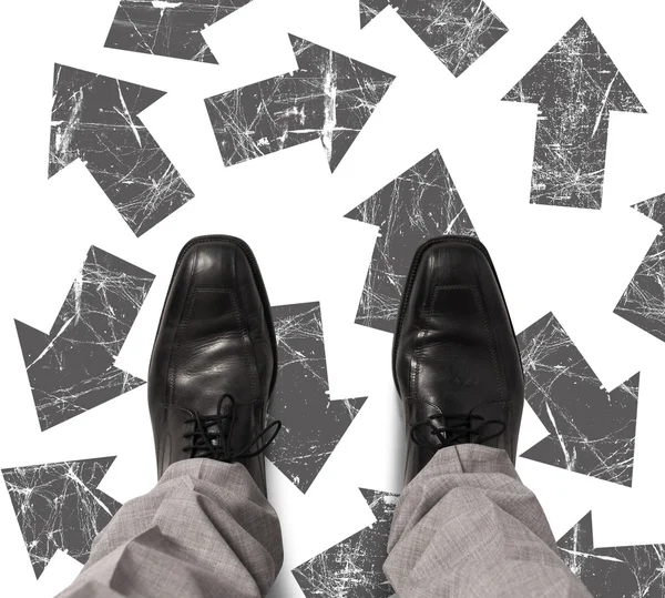 Businessman undecided on direction - Stock Image - Everypixel