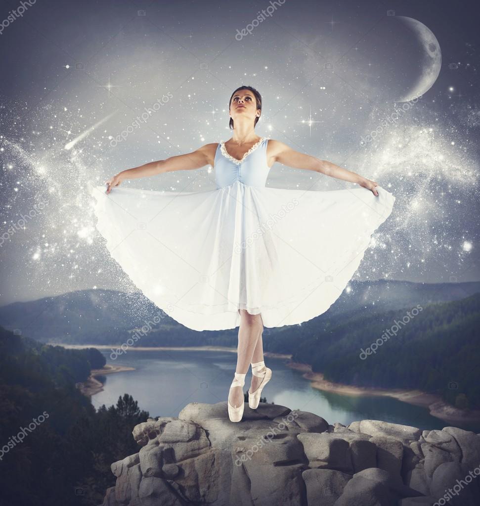 Ballerina dancing above a rock — Stock Photo © alphaspirit #83654302
