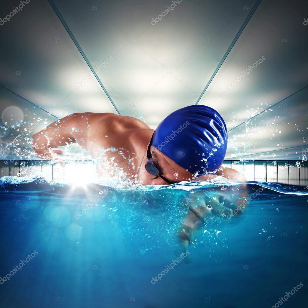Swimmer swimming in a pool Stock Photo by ©alphaspirit 95511474