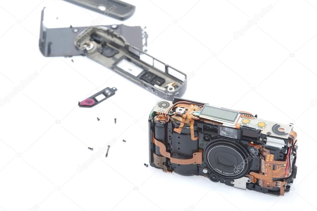 Exploded camera laying on white background — Stock Photo © stockarch ...