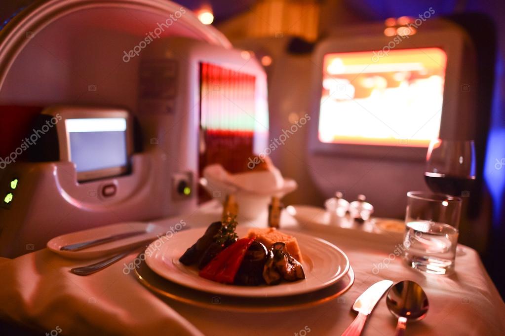 Dinner in first class Boeing-777 — Stock Editorial Photo © teamtime ...