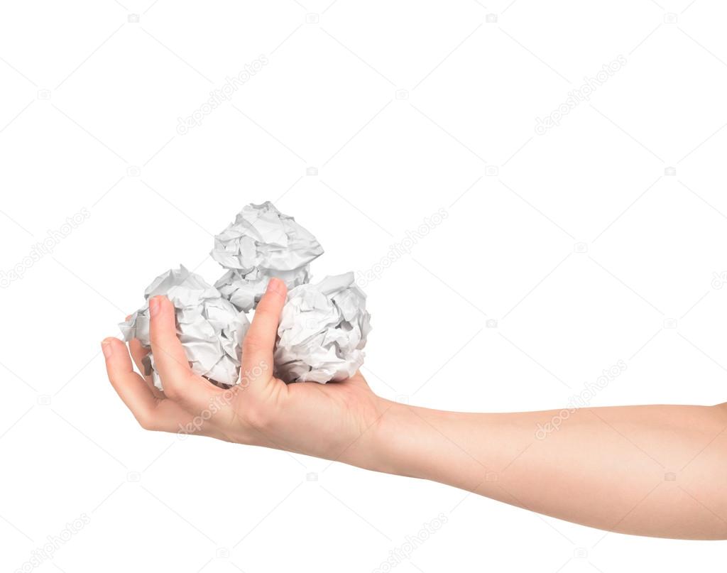 Hand holding crumpled paper balls isolated on white background. Stock ...