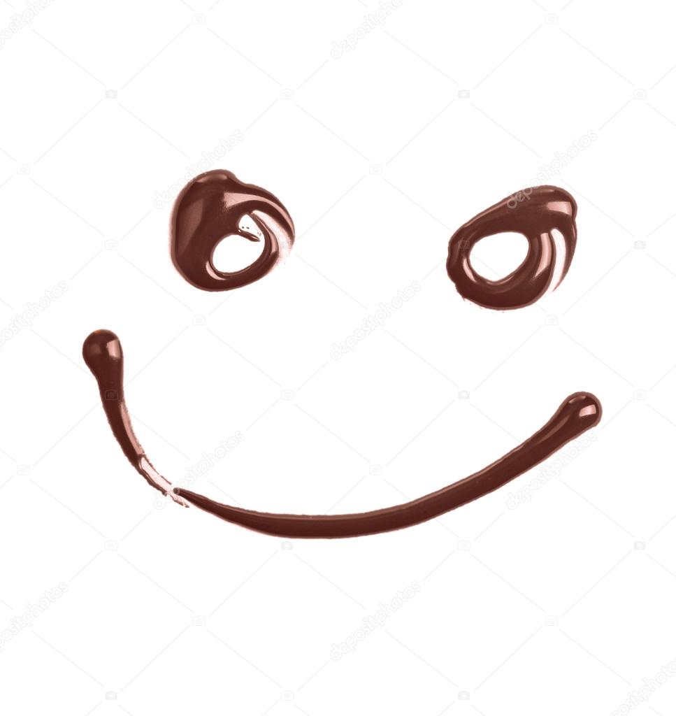 Smiley face made of chocolate syrup is isolated on a white backg ...