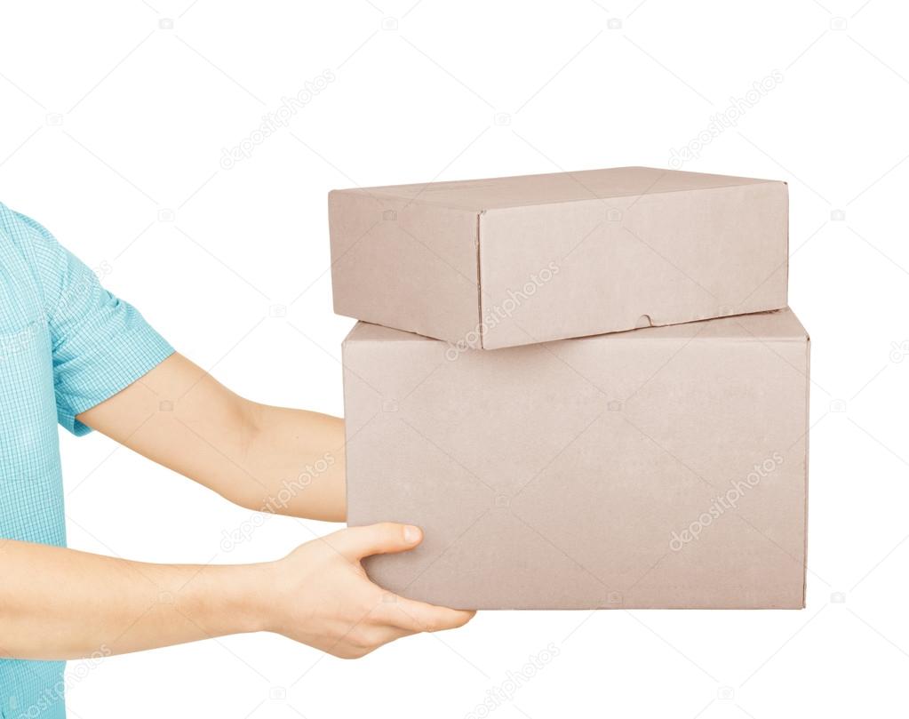 Man's hand with cardboard boxes on white background — Stock Photo ...