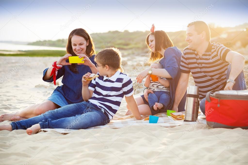 Family of five doing selfy at the picnic on the beach — Stock Photo ...
