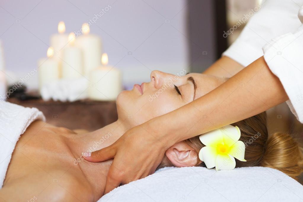 Close up portrait of a young woman getting spa treatment — Stock Photo ...