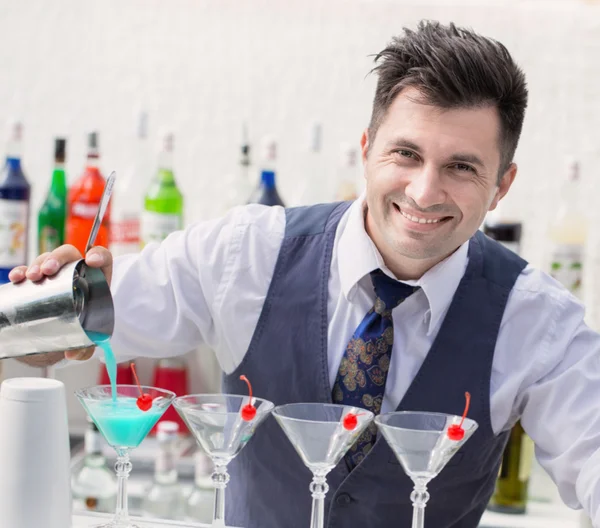 Barman pouring a cocktail drink Stock Photo by ©Kruchenkova 53658089