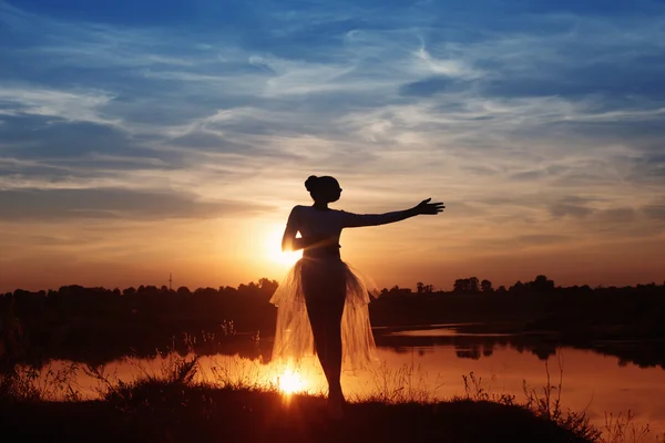 Silhouette of a Ballet Dancer at Sunset Outdoors - Stock Image - Everypixel