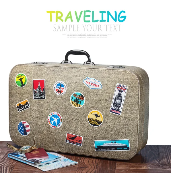 Travel suitcase with stickers Stock Photo by ©belchonock 69255415
