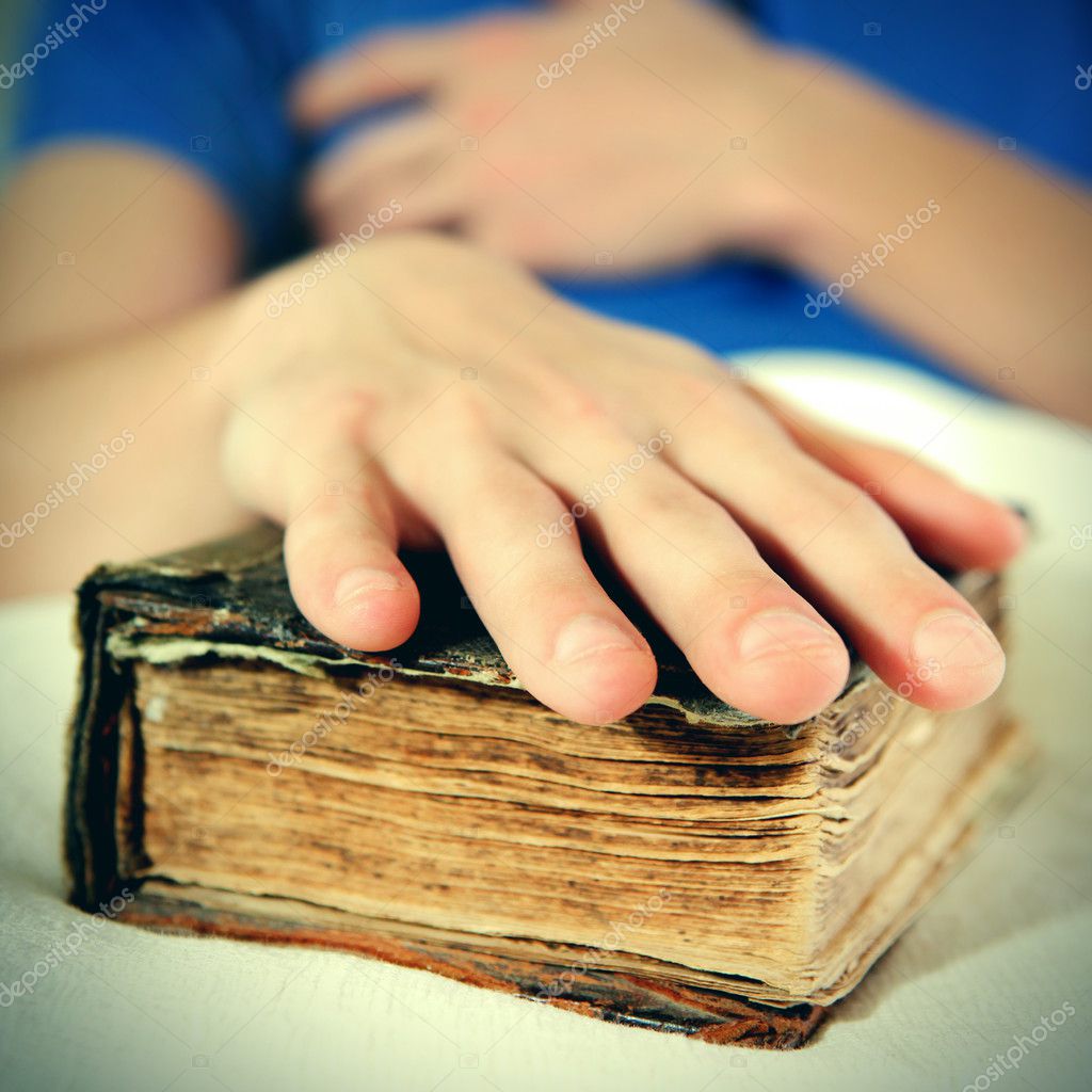 Hand on the Old Book — Stock Photo © sabphoto #82273666