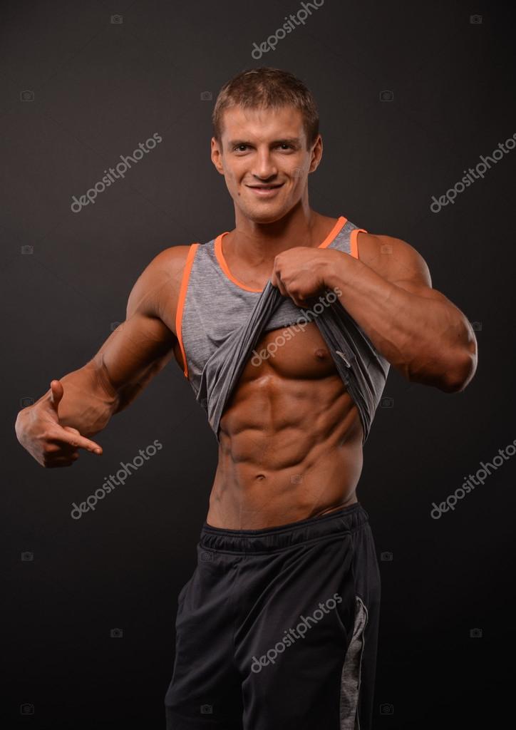 Muscled male model Stock Photo by ©vishstudio 58065781