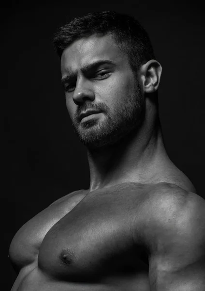 Male fitness model Stock Photo by ©vishstudio 93321956