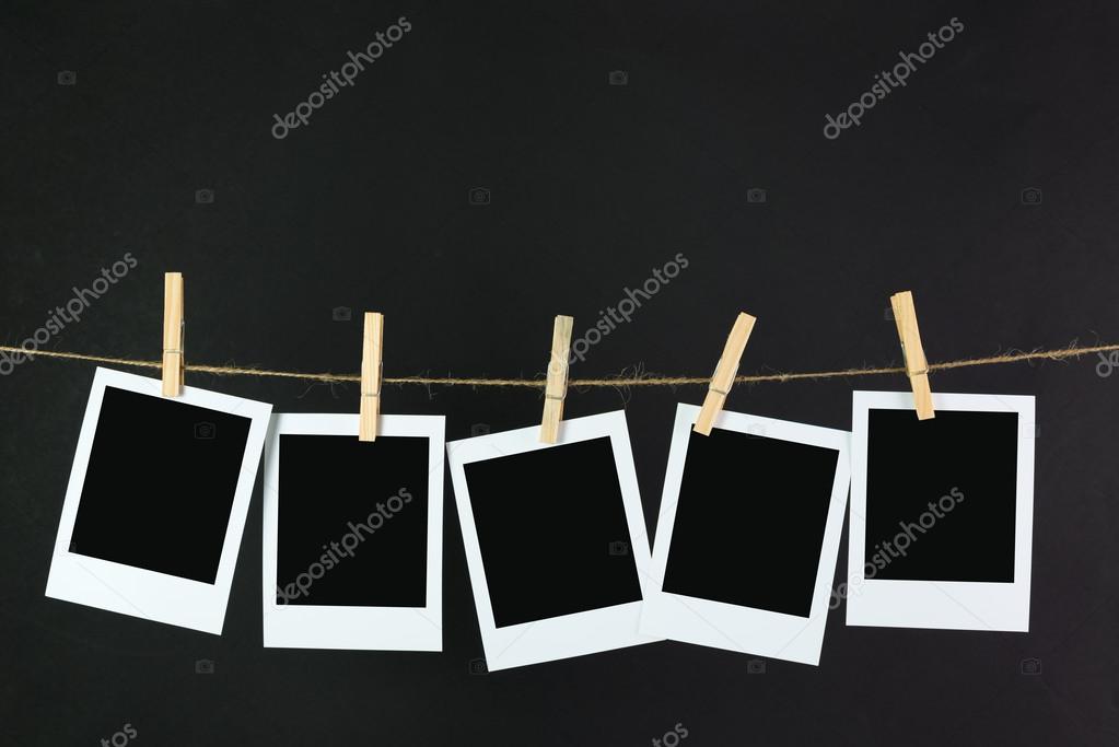 Photos hanging on rope — Stock Photo © shirotie #122735788