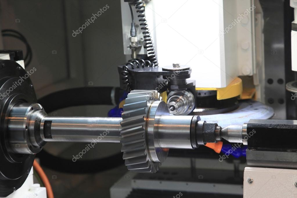 Control of manufacturing gears Stock Photo by ©spopov 80302842