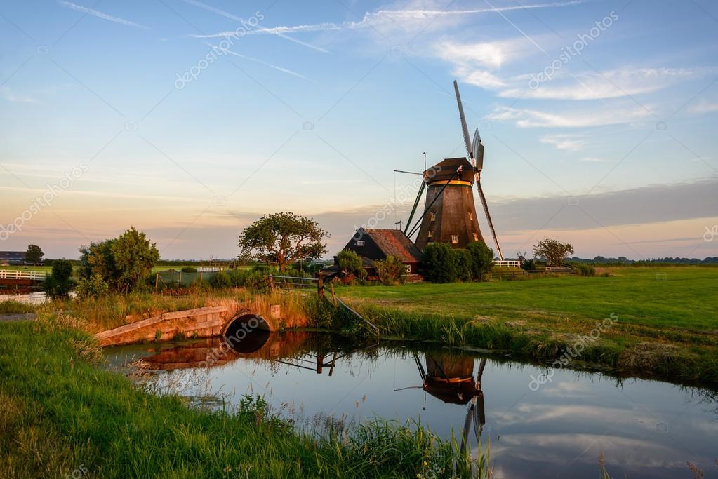 Windmill in the countryside in Holland Stock Photo by ©pljvv1 103419304