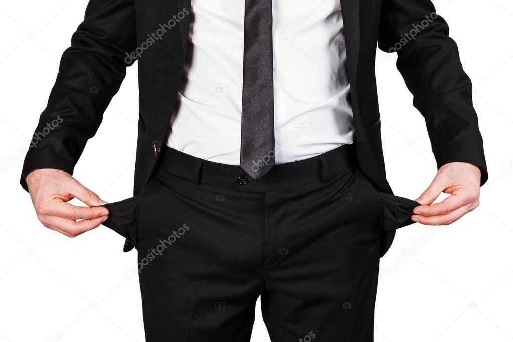 Bankrupt showing empty pockets Stock Photo by ©Ivantsov 100725610