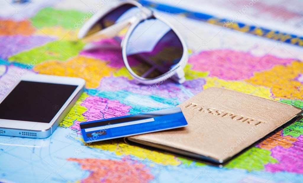 Objects for travel isolated on a map background Stock Photo by ...