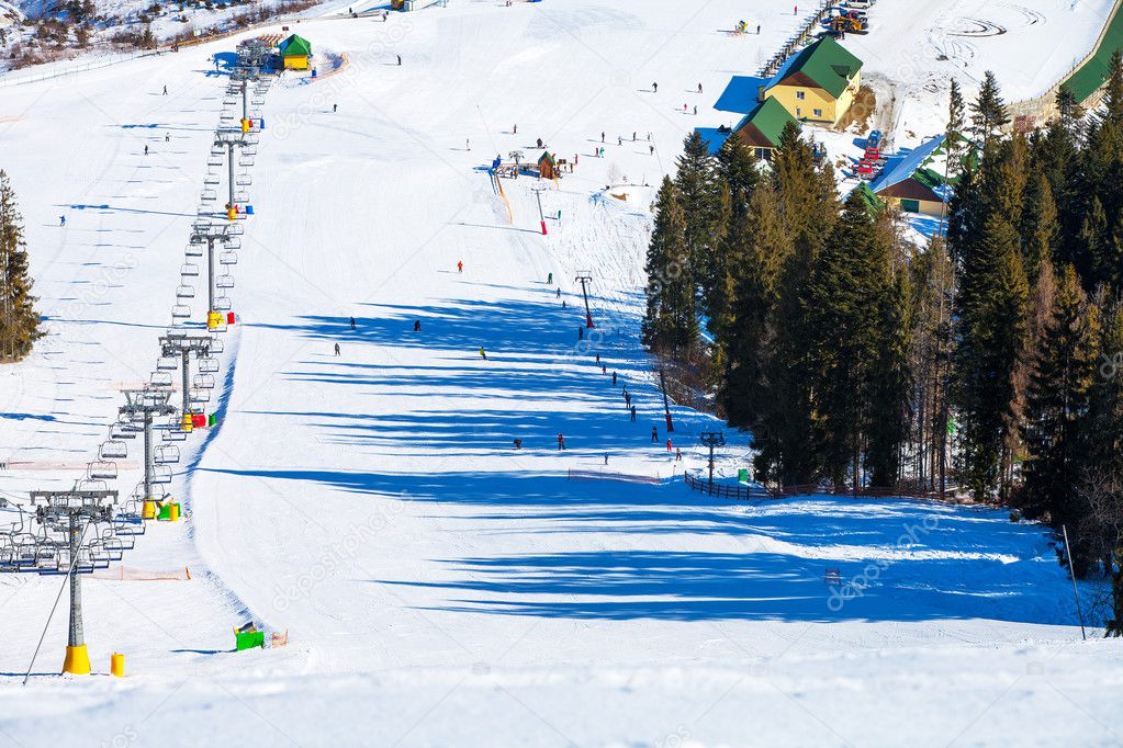 Chairs on chairlift ropeway Stock Photo by ©Ivantsov 97497398 Chairs on chairlift ropeway Stock Photo by ©Ivantsov 97497398