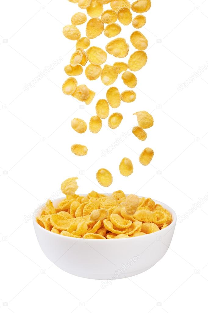 Corn flakes falling in bowl — Stock Photo © krasyuk #82160390