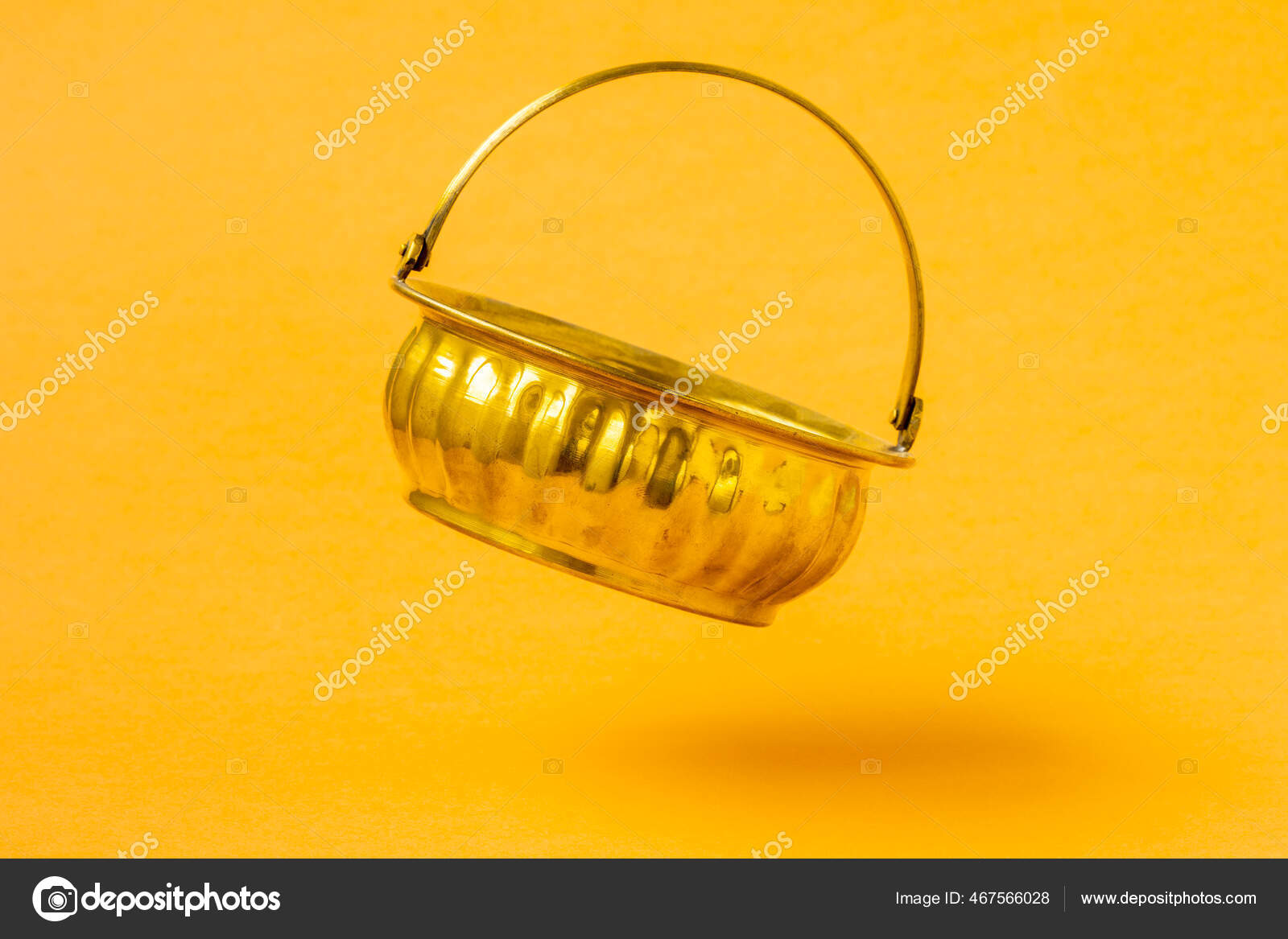 Empty Golden Pot Falling Yellow Background — Stock Photo © grapix ...