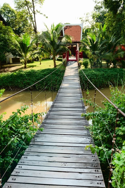 Wooden long rope bridge — Stock Photo © Iryna_Rasko #51421943