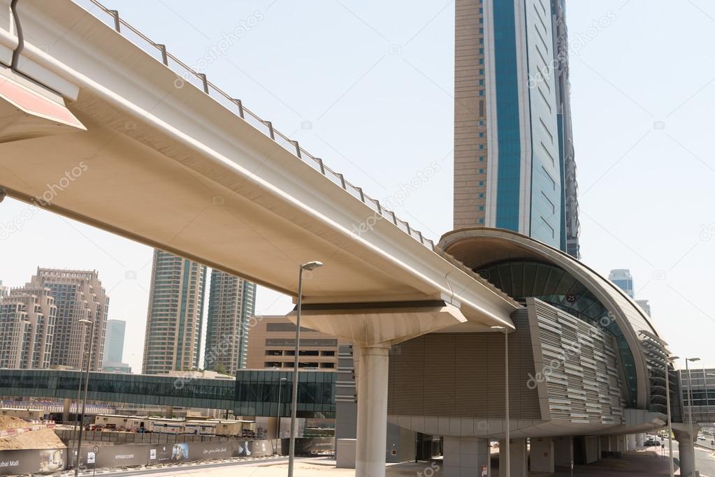 Modern architecture of a monorail commuter train station along a ...