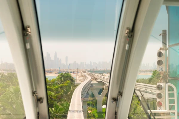 Modern architecture of a monorail commuter train station along a ...
