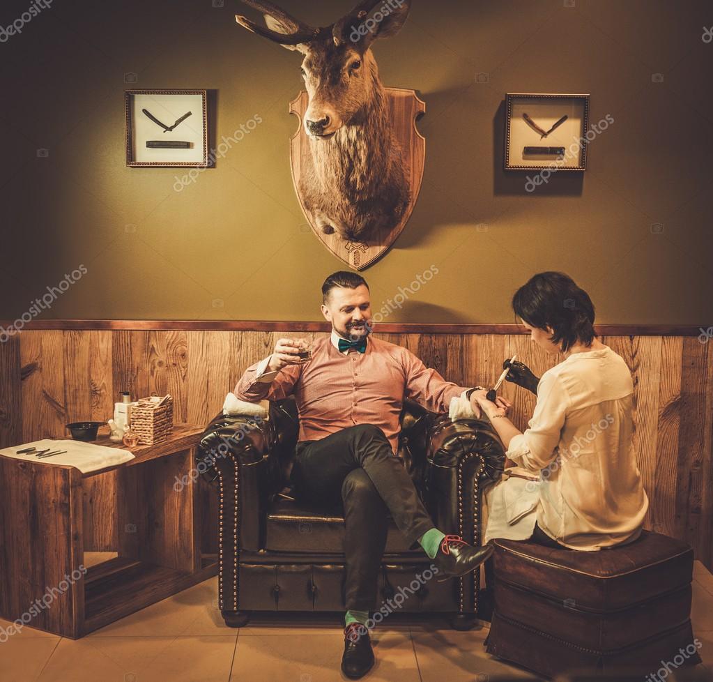Old-fashioned man doing male manicure — Stock Photo © nejron #104635768