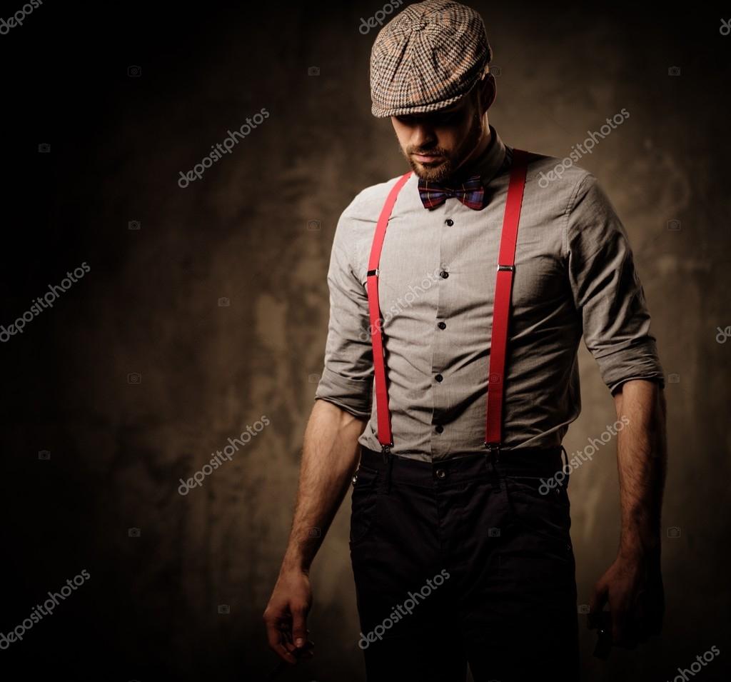 Serious old-fashioned man Stock Photo by ©nejron 110289400