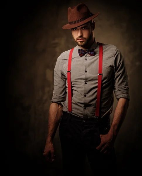 Serious old-fashioned man Stock Photo by ©nejron 110289400