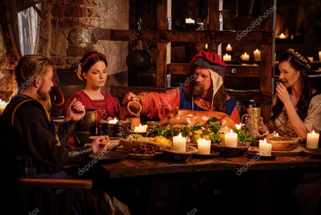 Medieval people eat and drink Stock Photo by ©nejron 110290940