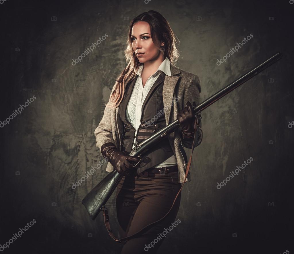 Lady with shotgun Stock Photo by ©nejron 121655976