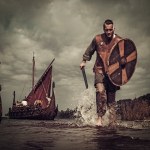 Strong Viking jumping from his ship to attack Stock Photo by ©khosrork ...
