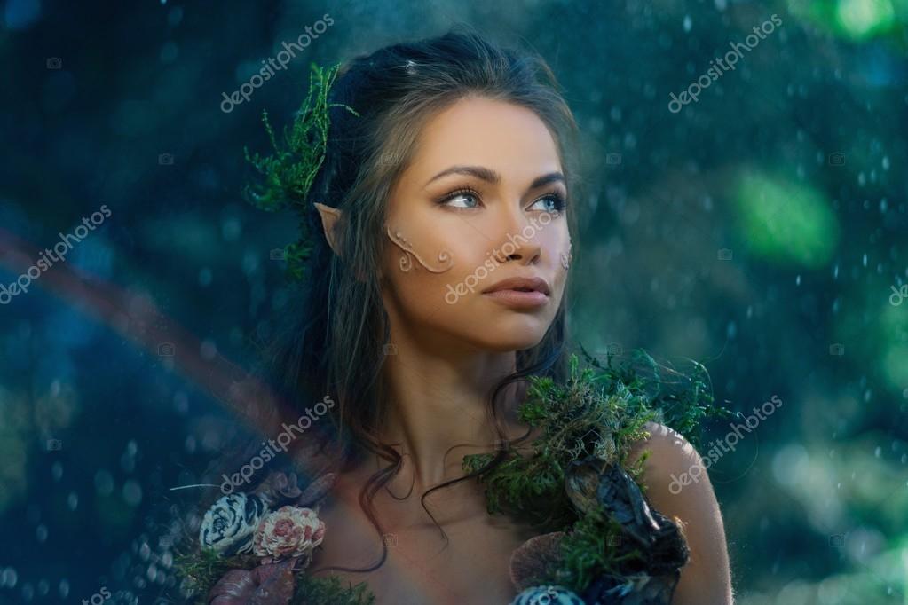 Elf woman in a magical forest — Stock Photo © nejron #80541448
