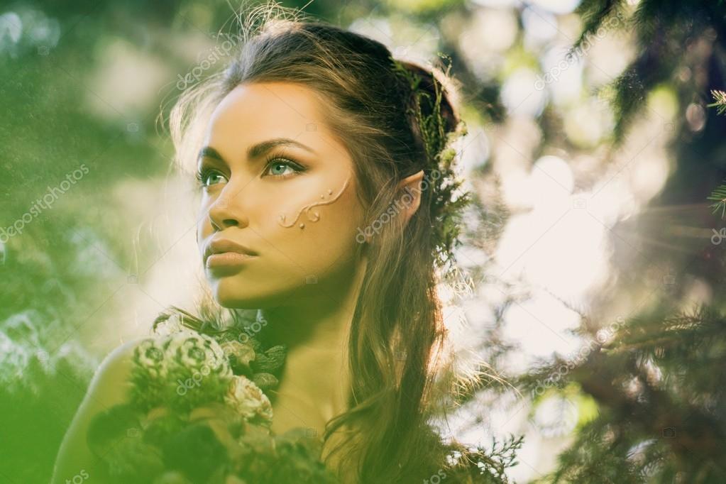 Elf woman in a magical forest Stock Photo by ©nejron 80541500
