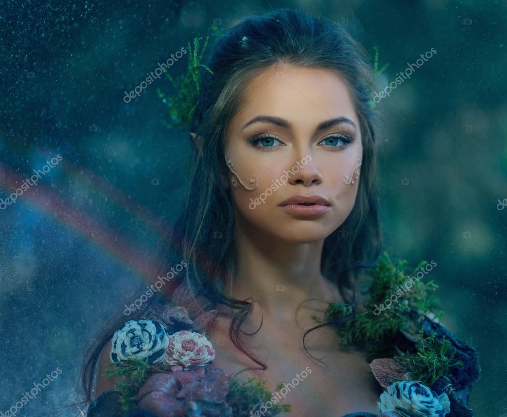 Elf woman in a magical forest Stock Photo by ©nejron 80925462