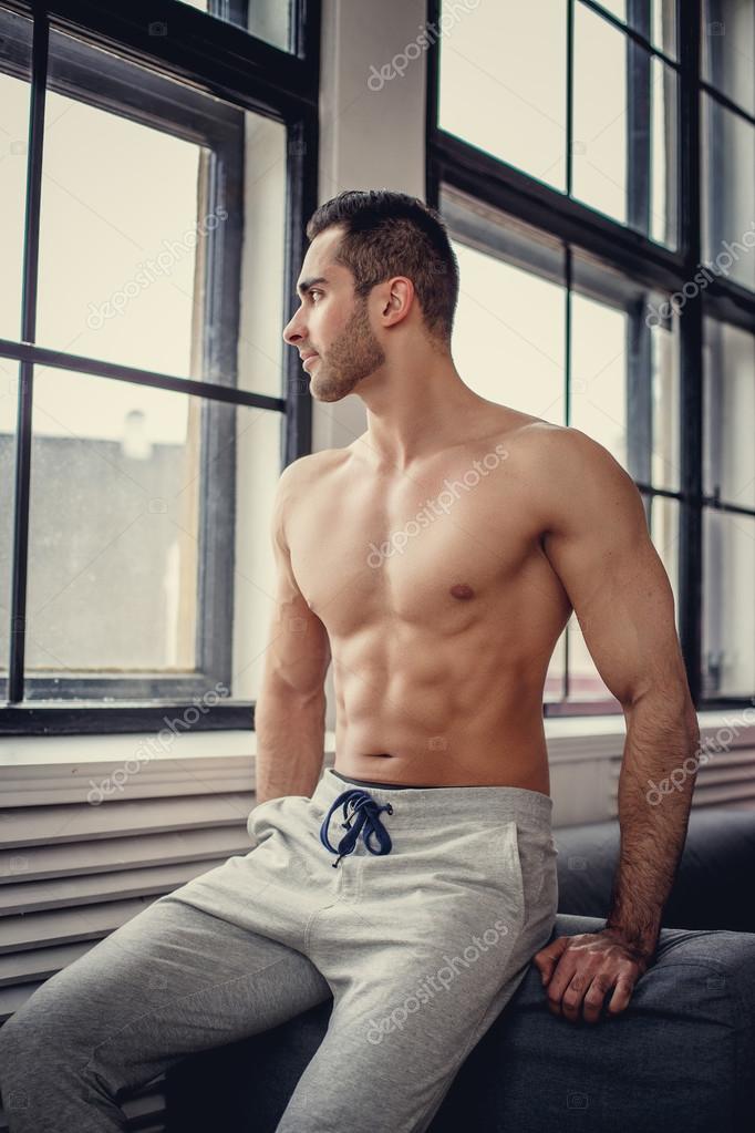 Man posing near window — Stock Photo © fxquadro #104521556