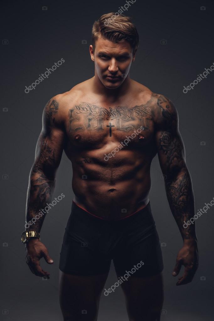 Man posing in a deep shadows — Stock Photo © fxquadro #105574162