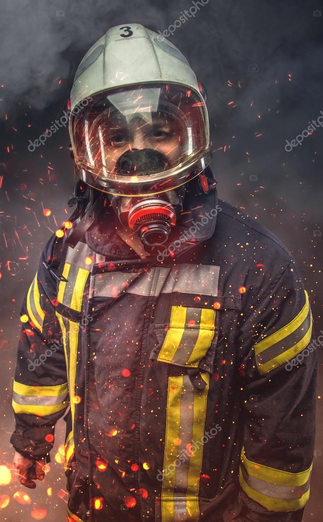 Firefighter in oxygen mask Stock Photo by ©fxquadro 110055288