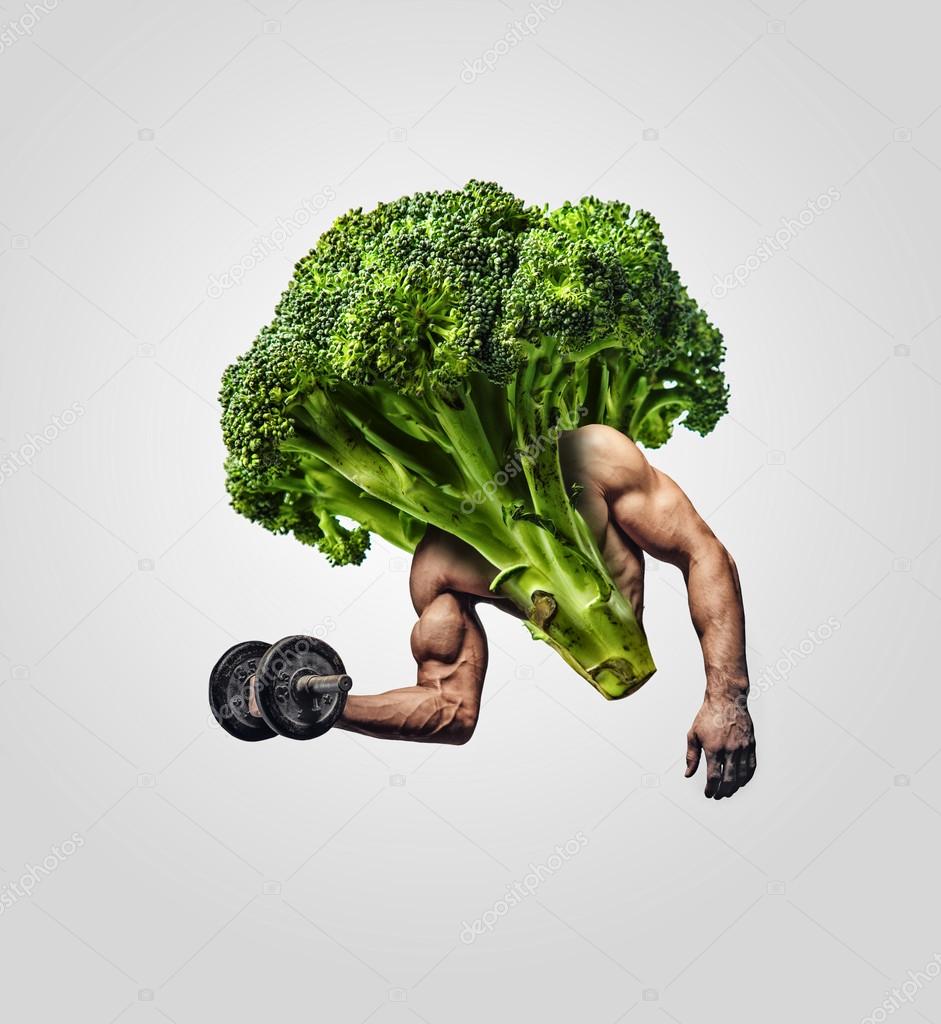 Broccoli with muscular man's hands. Stock Photo by ©fxquadro 113900046