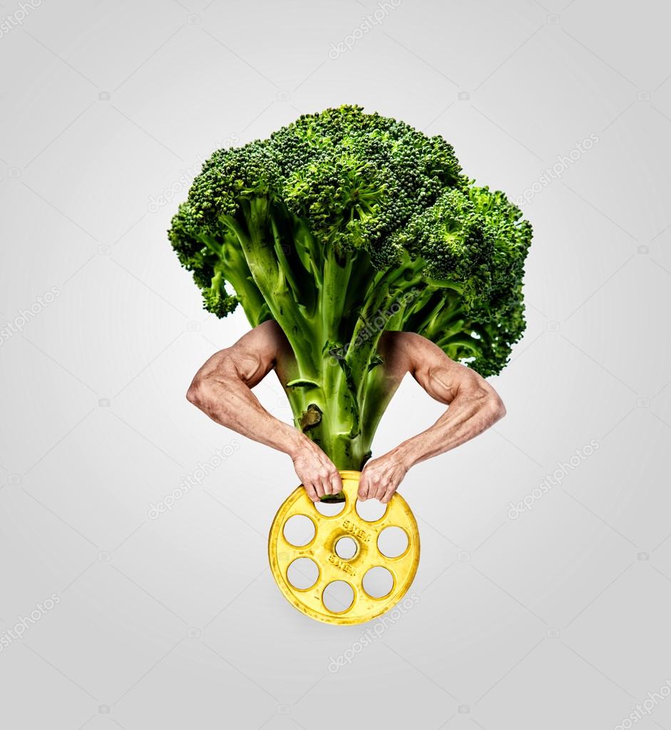 Broccoli with muscular man's hands — Stock Photo © fxquadro #114130832