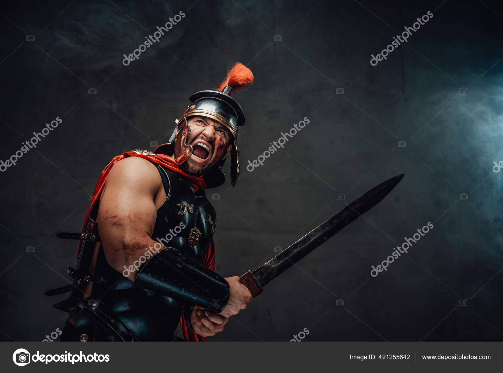 Mad imperial soldier from rome screaming in smokey background Stock ...