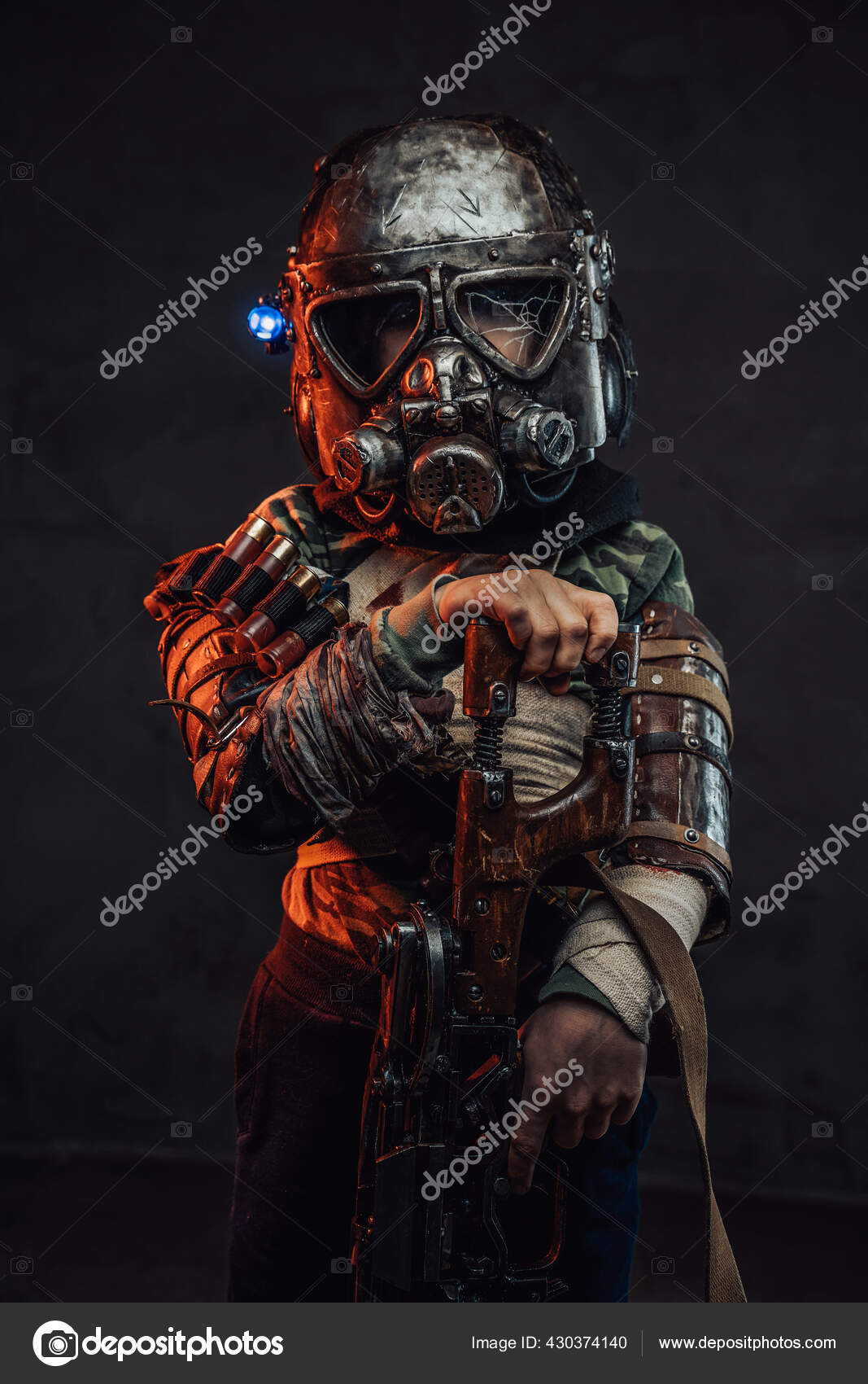 Armed with riffle little boy with gas mask in dark background Stock ...