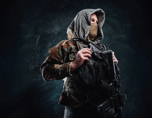 Special forces soldier in military uniform wearing mask and hood Studio ...